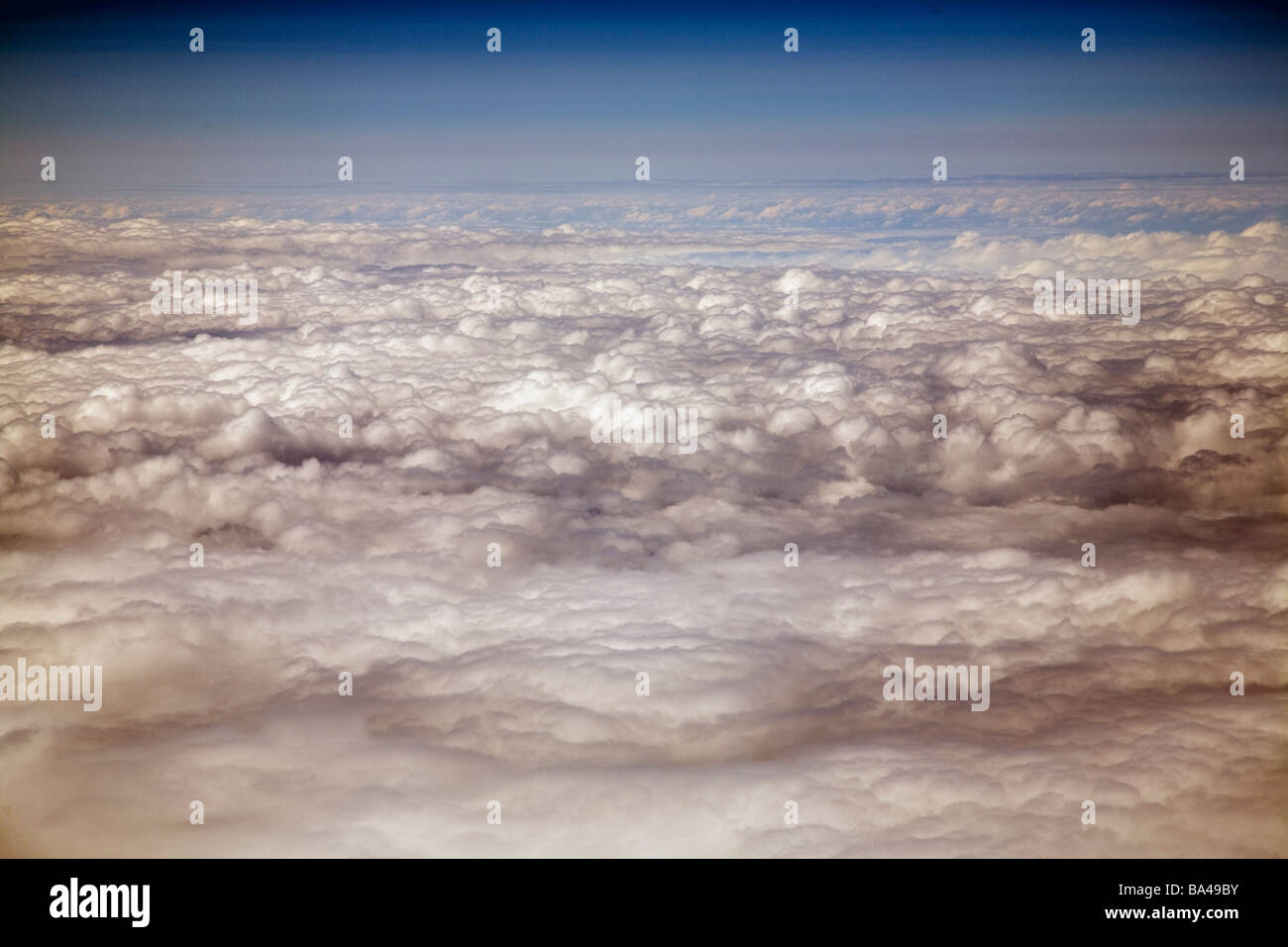 Clouds seen from an airplane window Stock Photo - Alamy