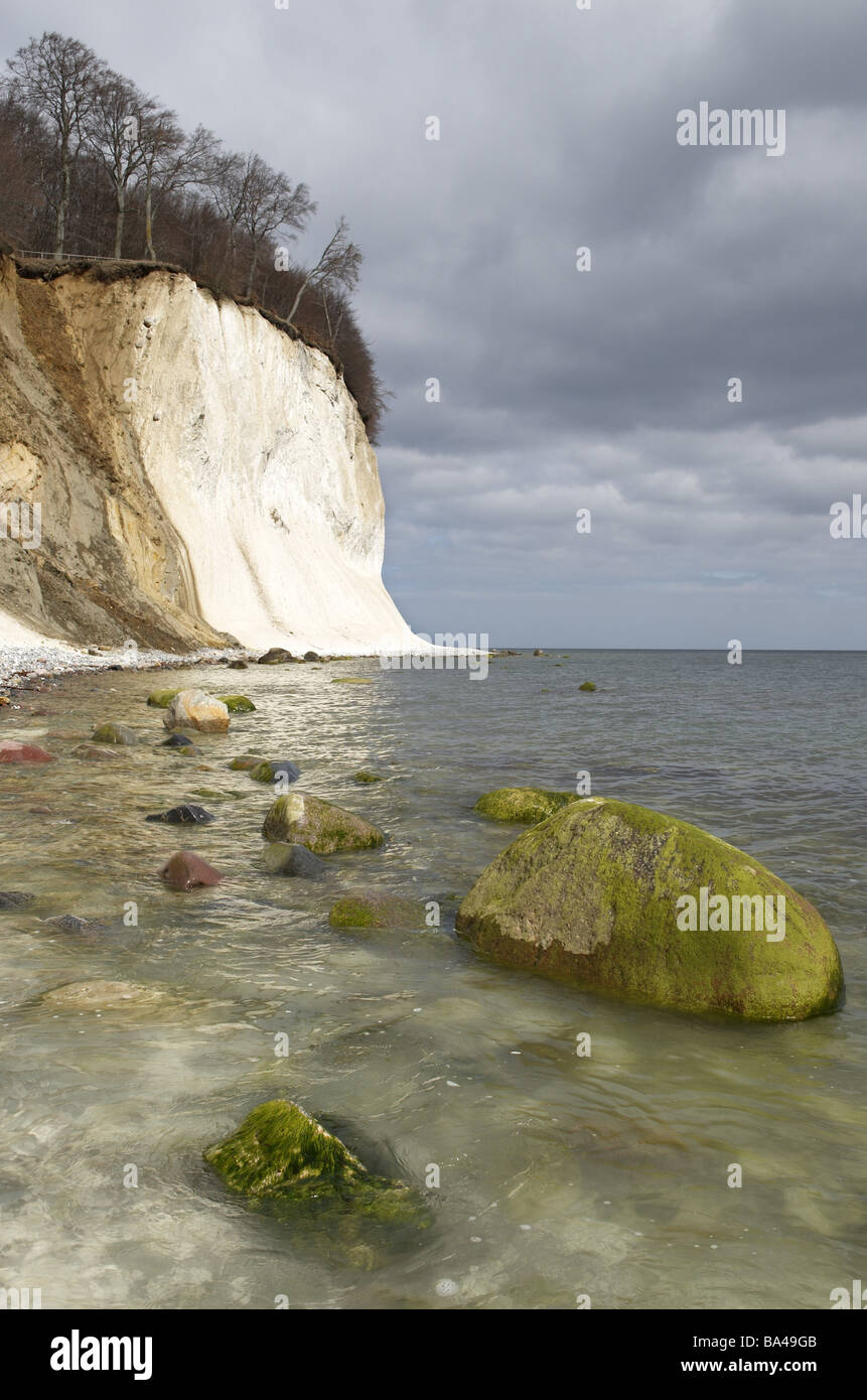 Chalk-rocks rocks shingle stones trees sea reflection heavens clouds ...