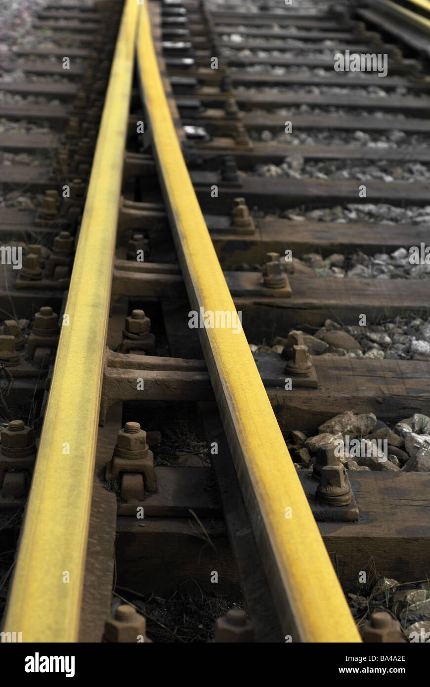 Tracks close-up detail fork rails points gravels thresholds rusty rusts ...