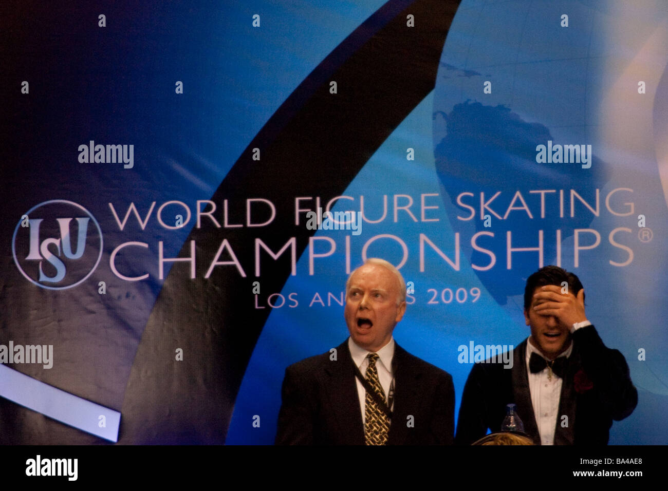 Evan Lysacek USA with his coach Frank Carroll after viewing his scores ...