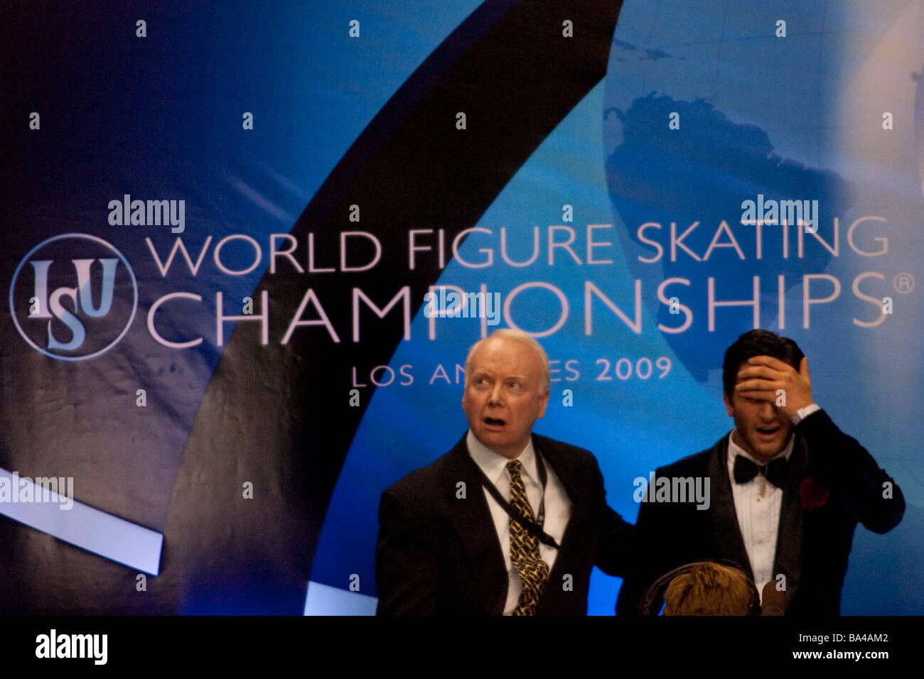 Evan Lysacek USA with his coach Frank Carroll after viewing his scores ...
