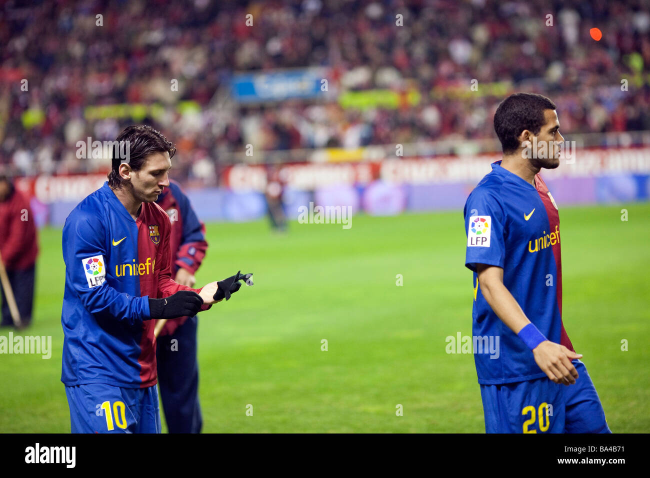 Messi (left) and Daniel Alves (right Stock Photo - Alamy