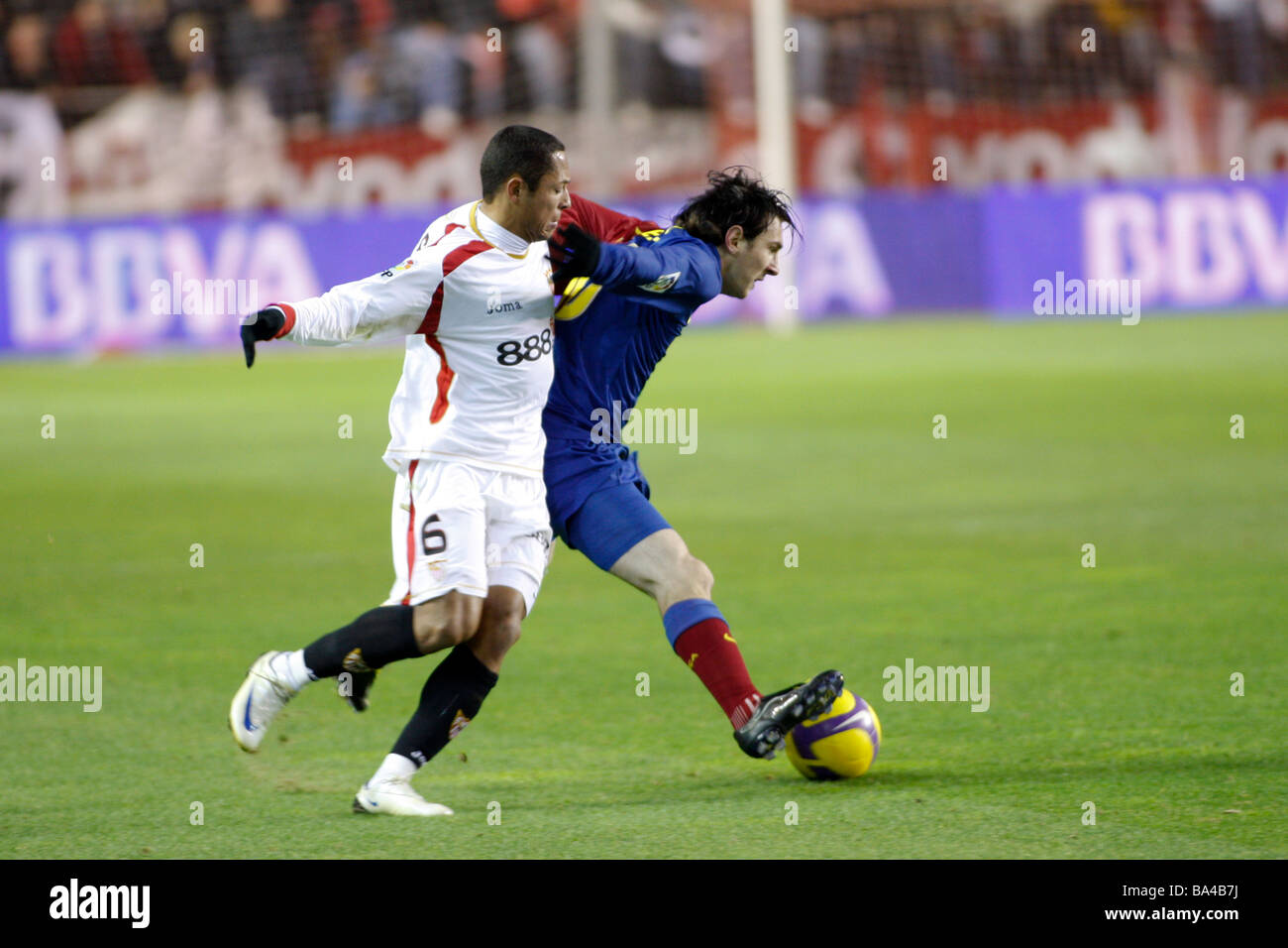 Adriano (left) fighting with Messi (right Stock Photo - Alamy