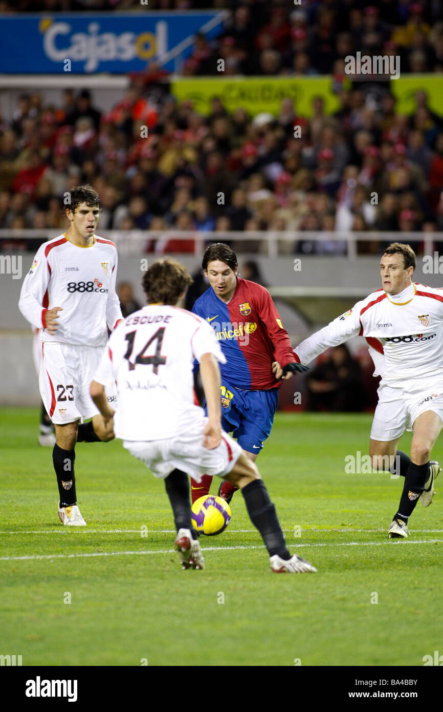 Messi surrounded by oponent players Stock Photo - Alamy