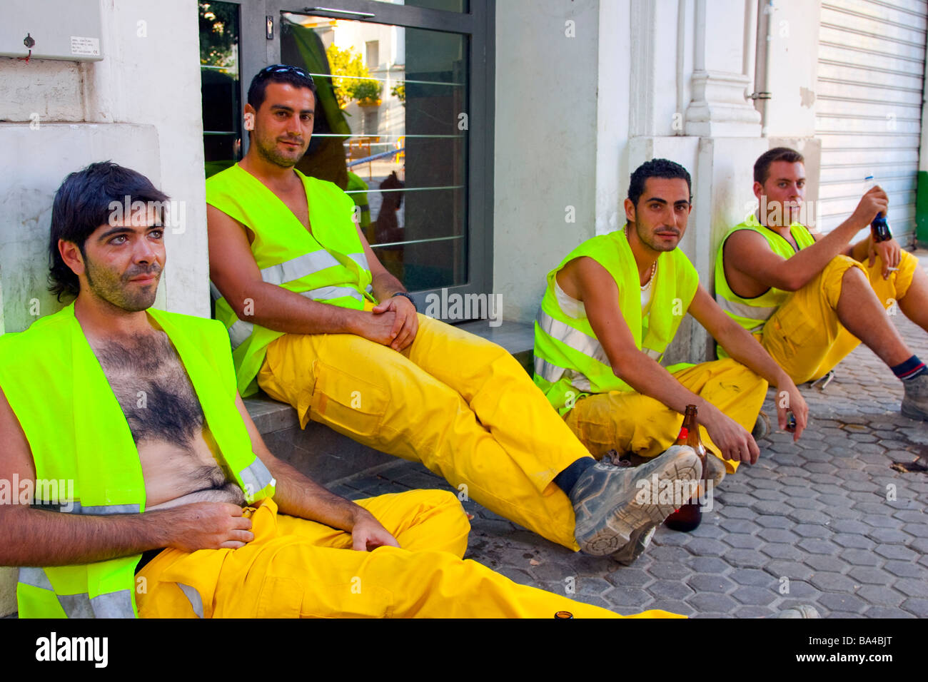 Spanish construction workers in a break Seville Spain Stock Photo - Alamy