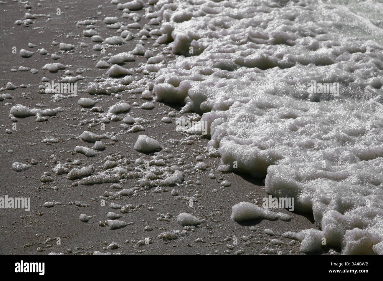 Beach sea surf spray sandy beach beach sand water waves waves foam ...