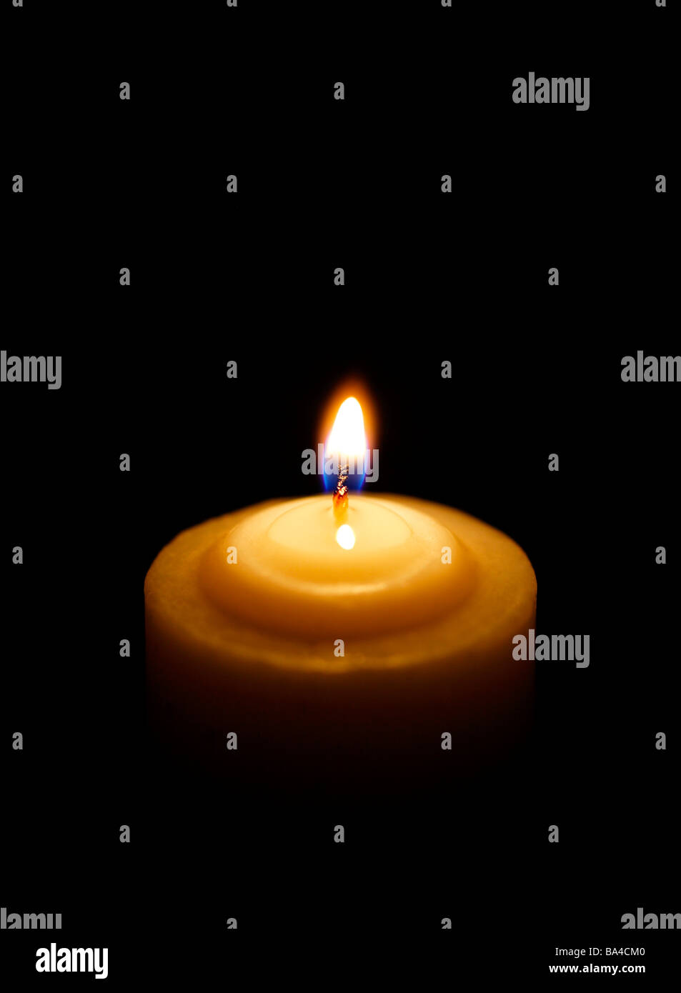 Lit candle close up Stock Photo - Alamy