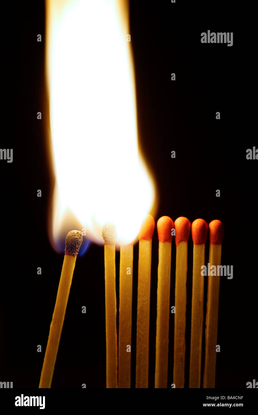 Matches on fire close up Stock Photo - Alamy