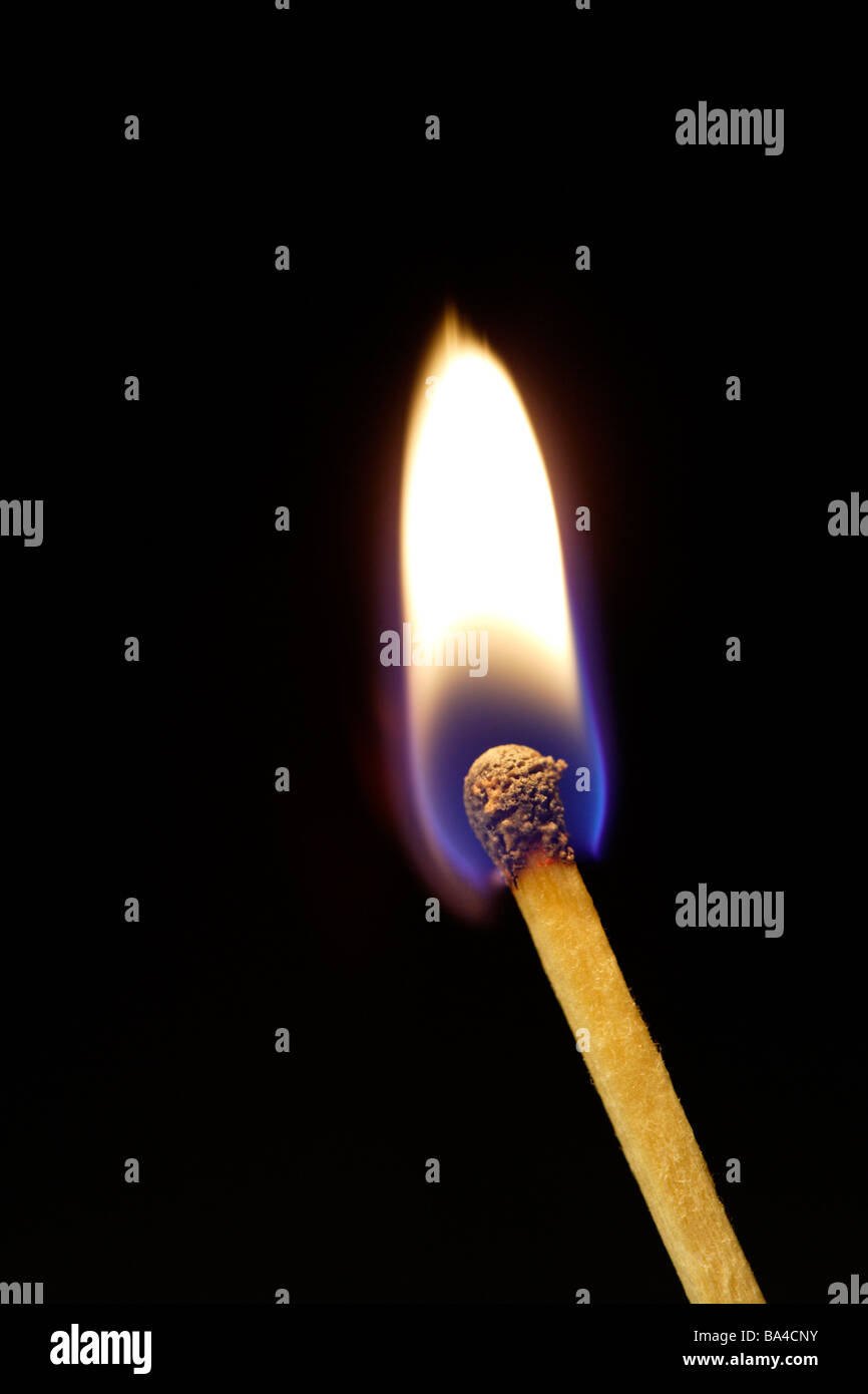 Lit candle close up Stock Photo - Alamy