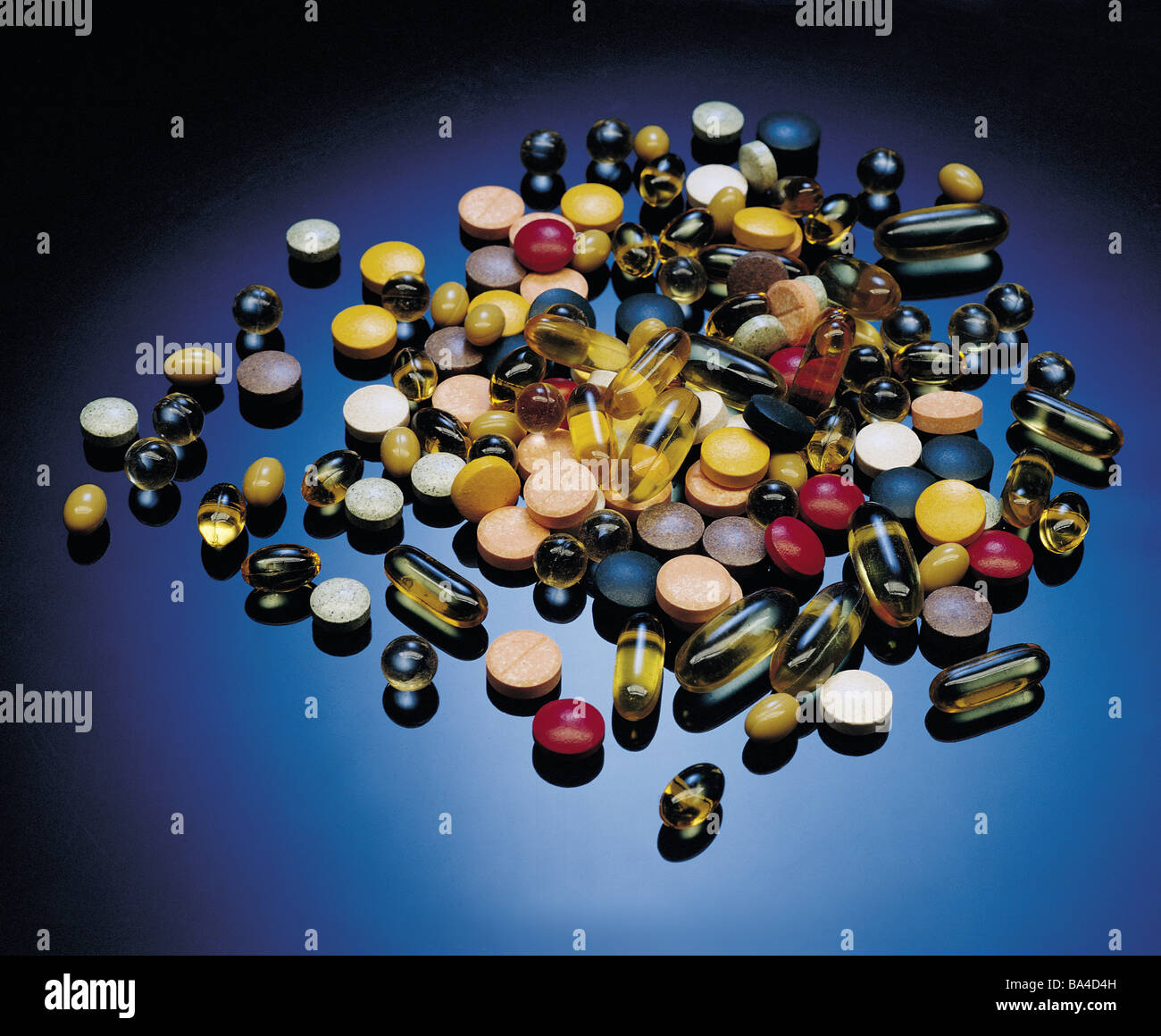 Assortment of vitamin tablets Stock Photo - Alamy
