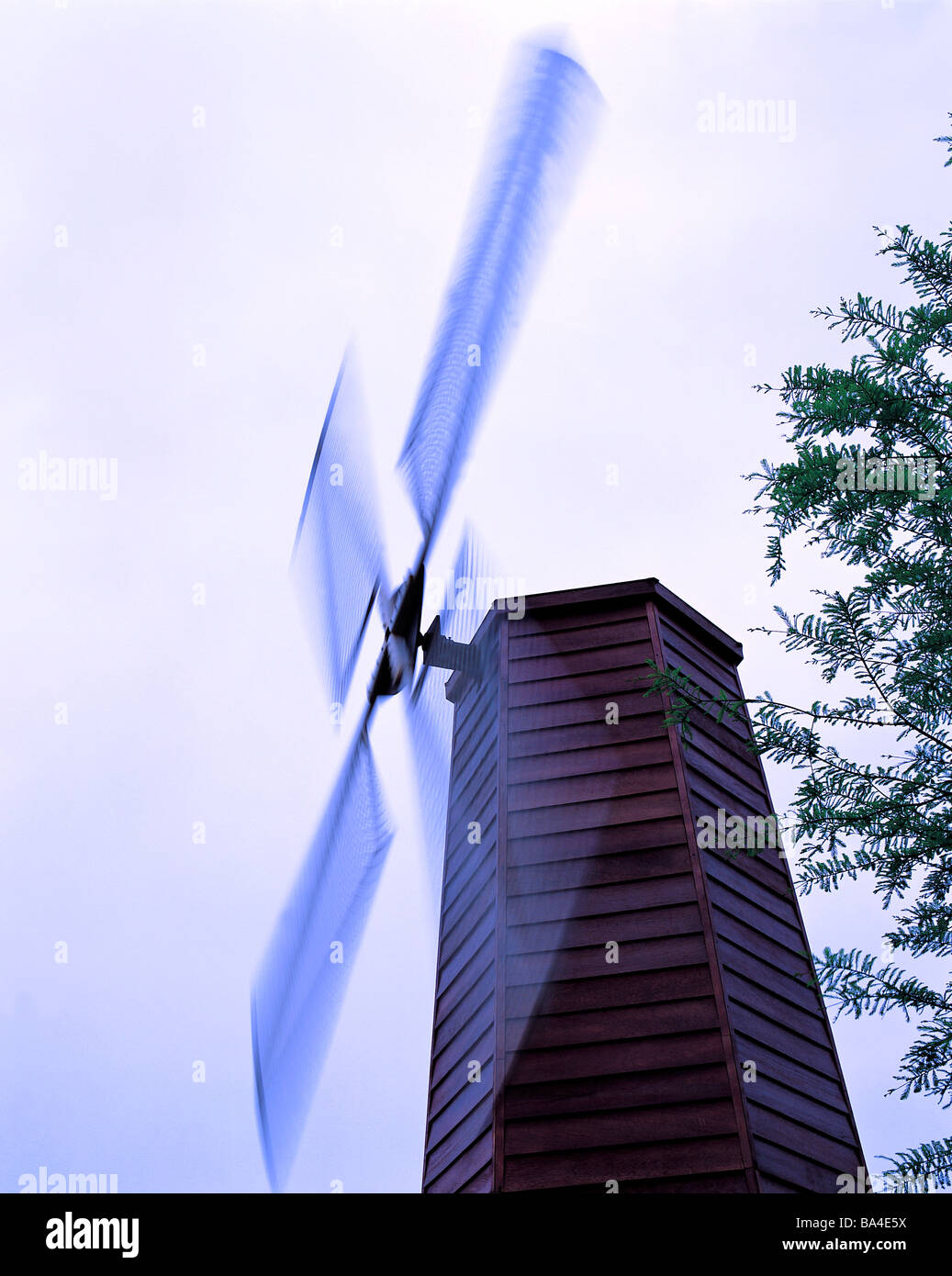 A windmill low angle view blurred motion Stock Photo - Alamy