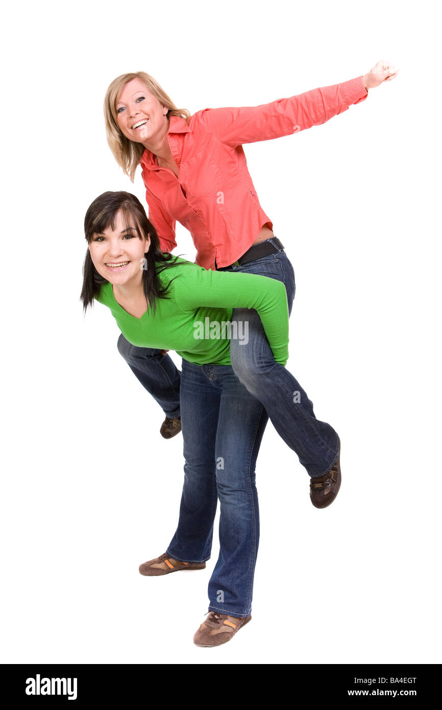 two crazy women in friendship over white background Stock Photo - Alamy