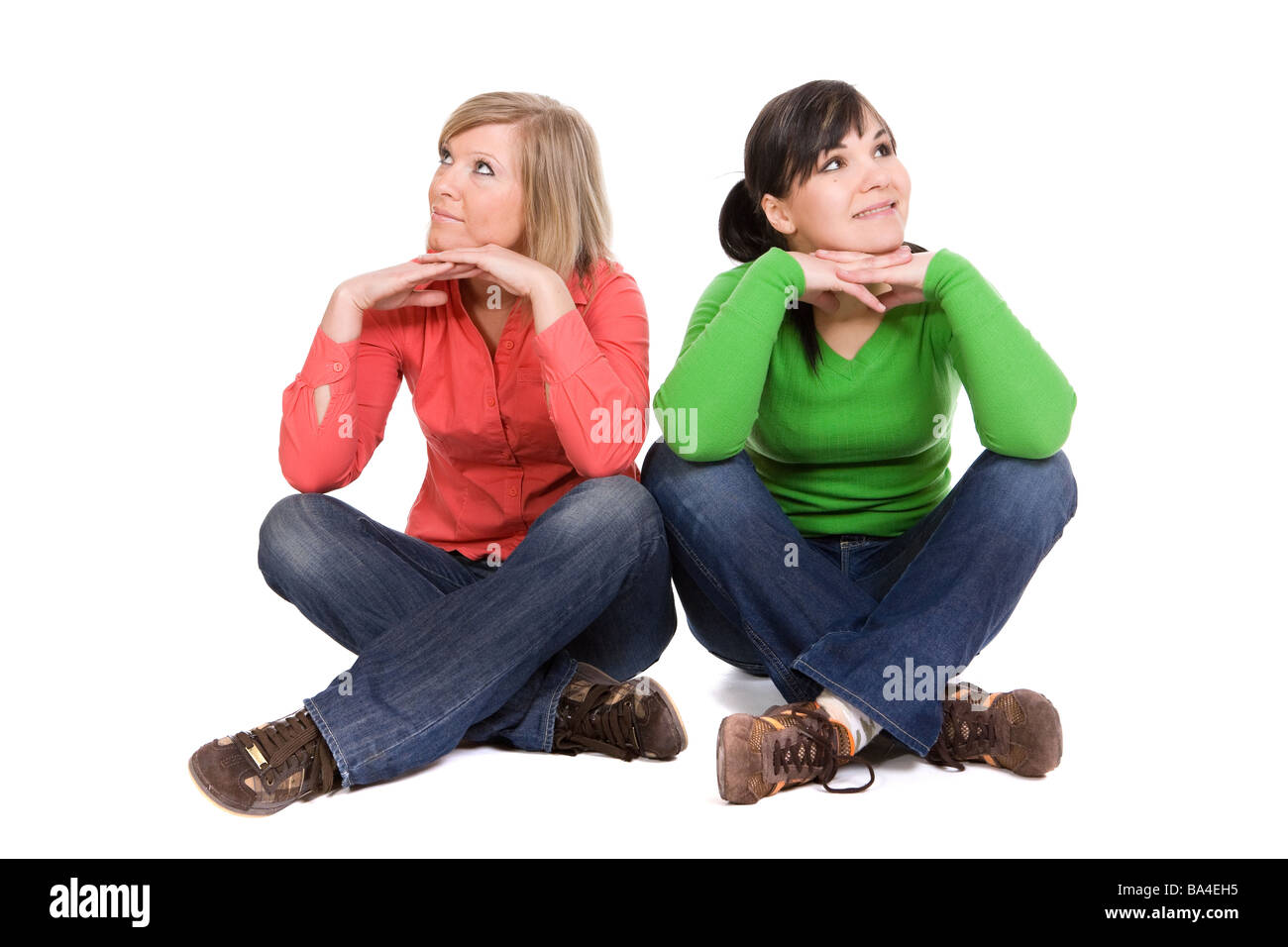 two crazy women in friendship over white background Stock Photo - Alamy
