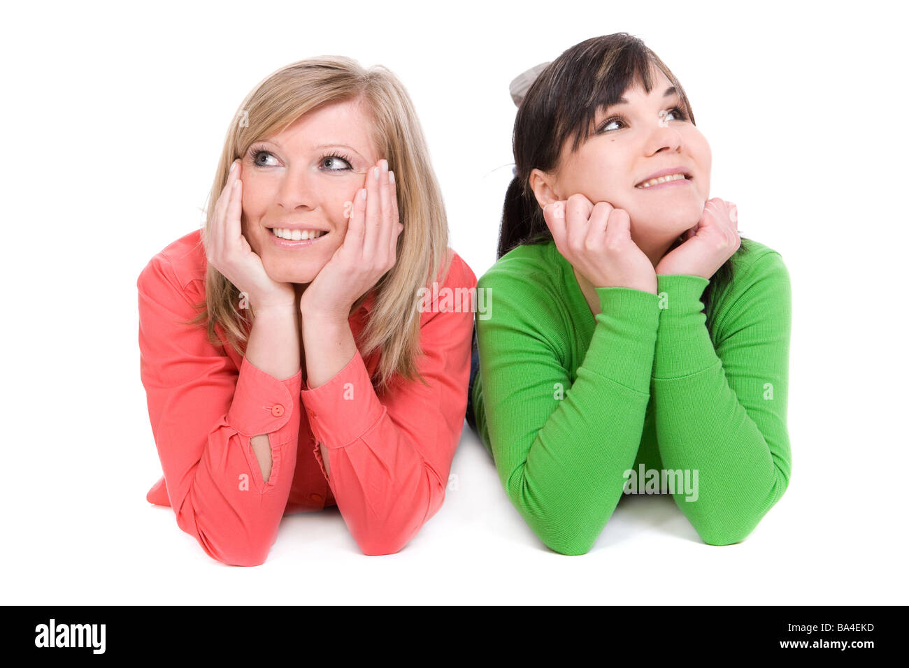 two crazy women in friendship over white background Stock Photo - Alamy