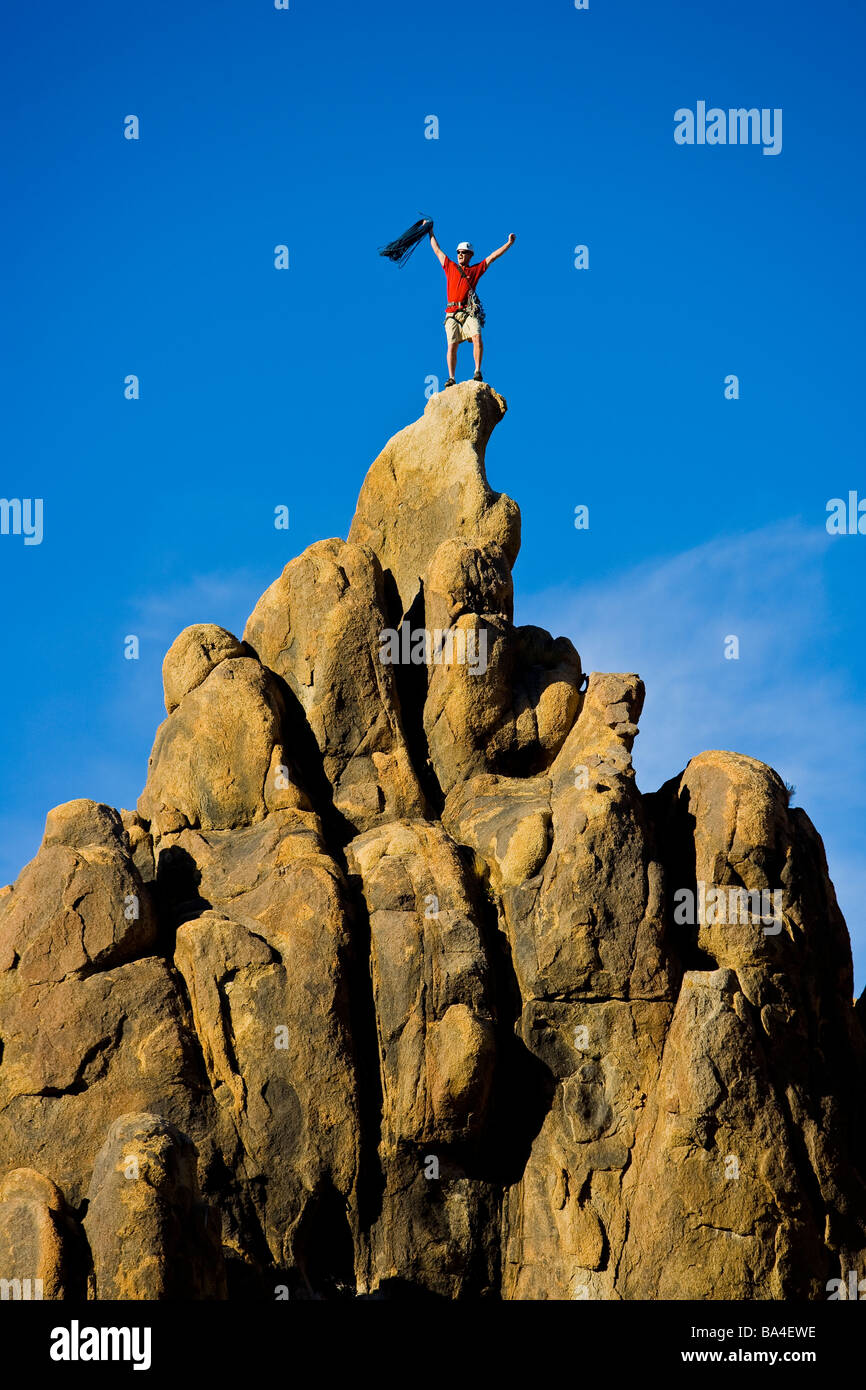 Climber on the summit Stock Photo - Alamy