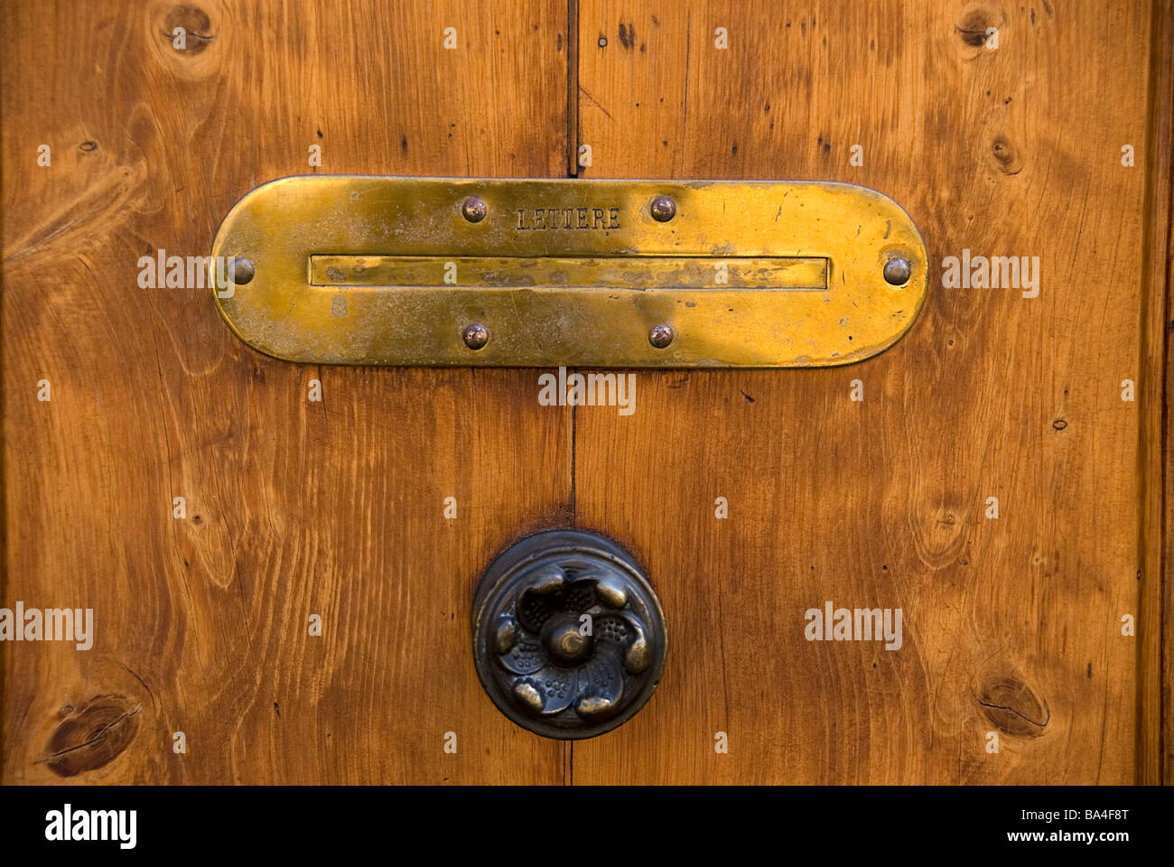 Letterbox and door handle Toscany Italy Stock Photo - Alamy
