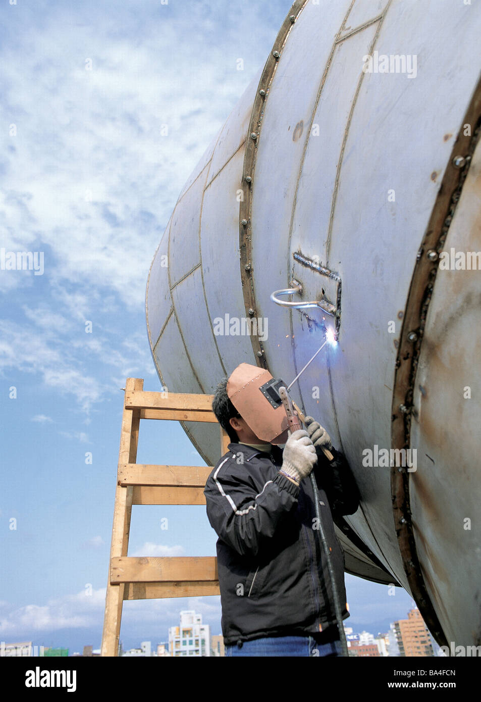 A people welding with the mask Stock Photo - Alamy