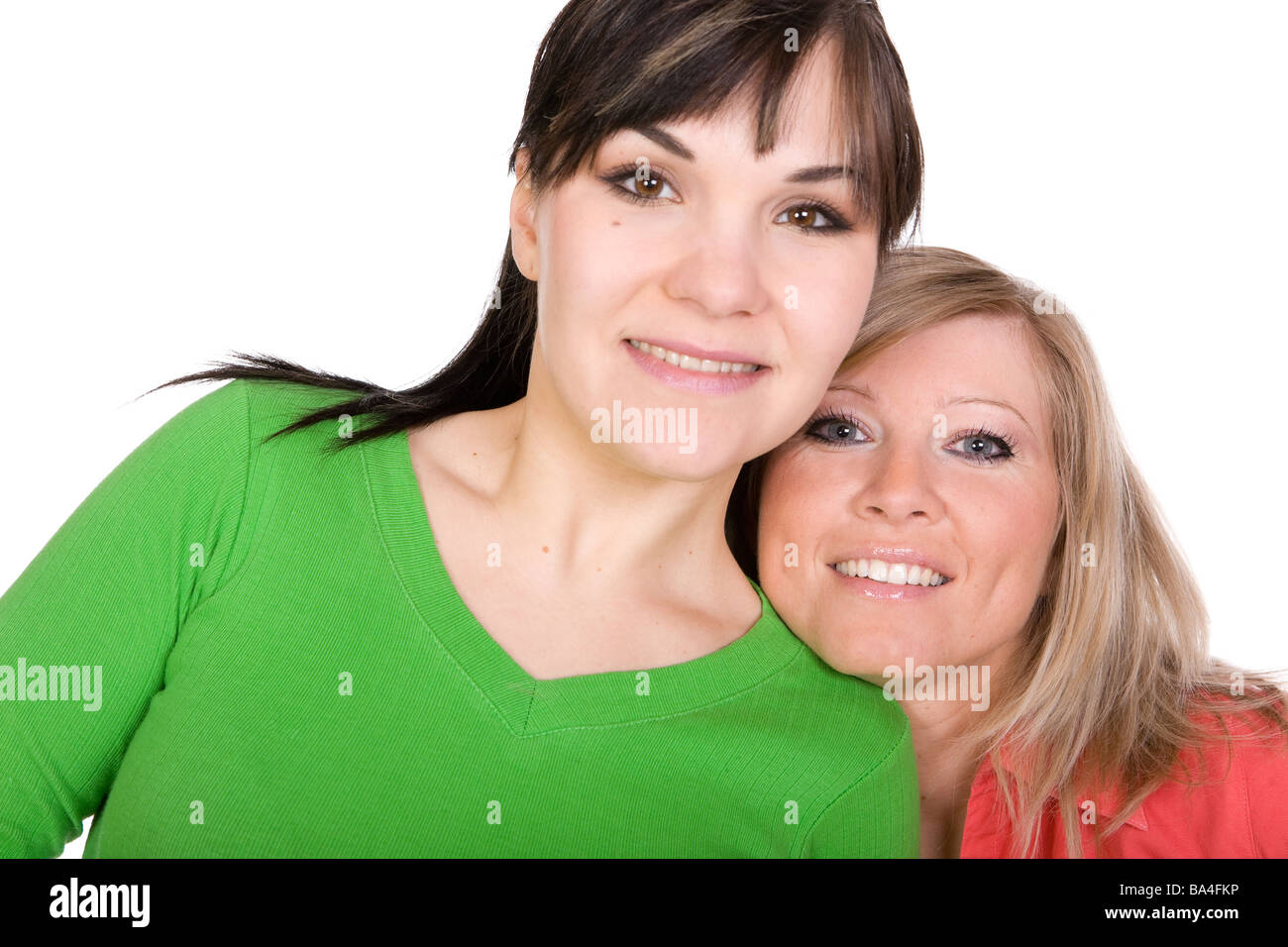two crazy women in friendship over white background Stock Photo - Alamy