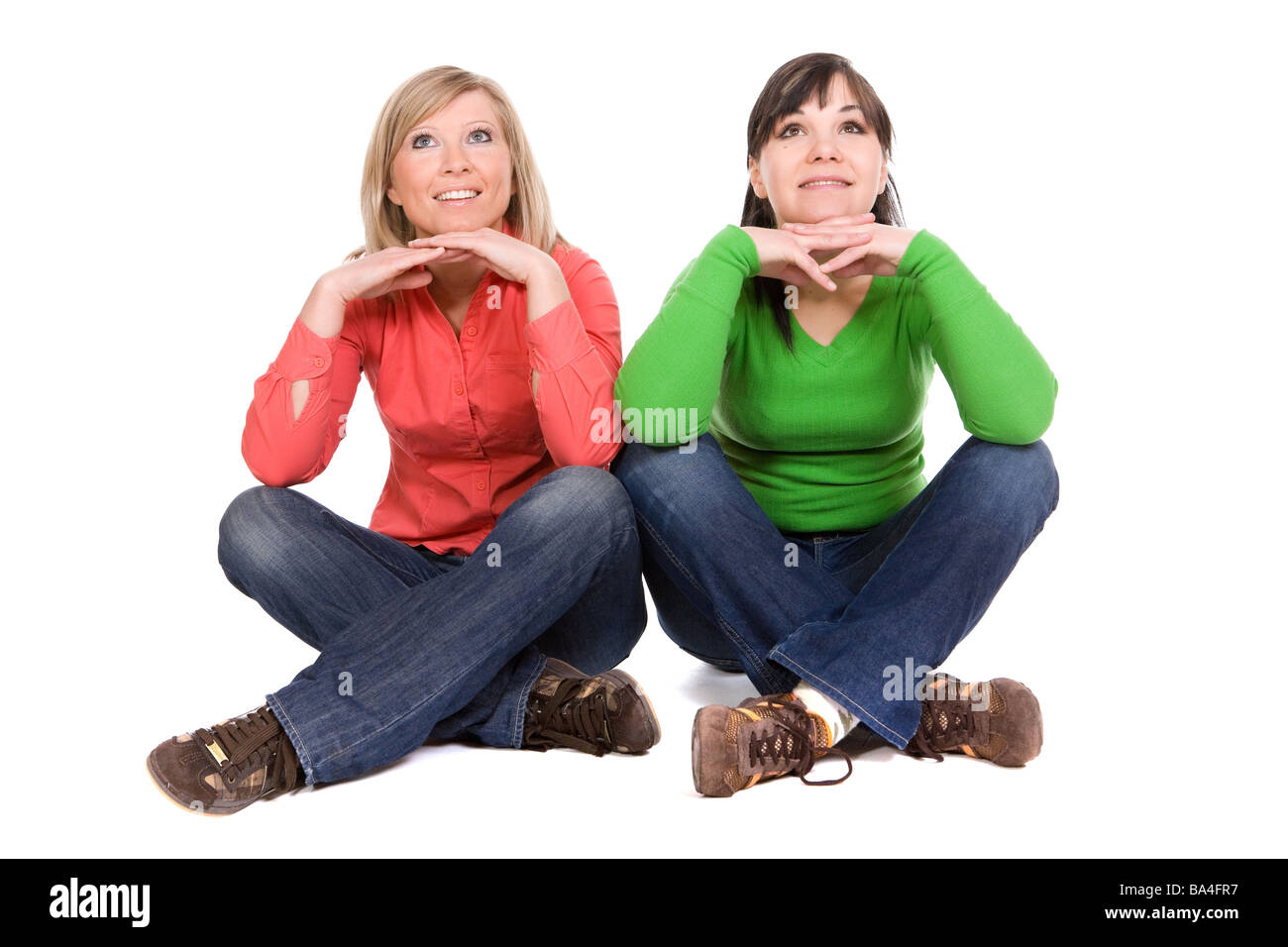 two crazy women in friendship over white background Stock Photo - Alamy