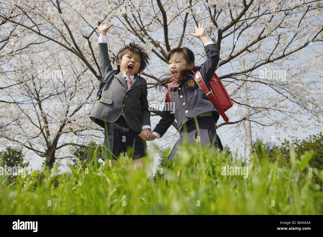 Two girls school uniform outdoor hi-res stock photography and images ...