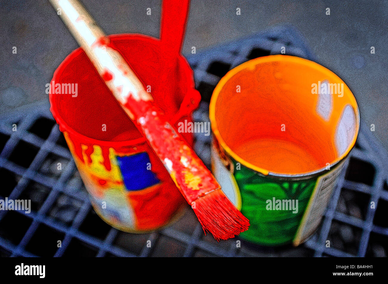 Food cans with brightly colored red and yellow paint dripping down the ...