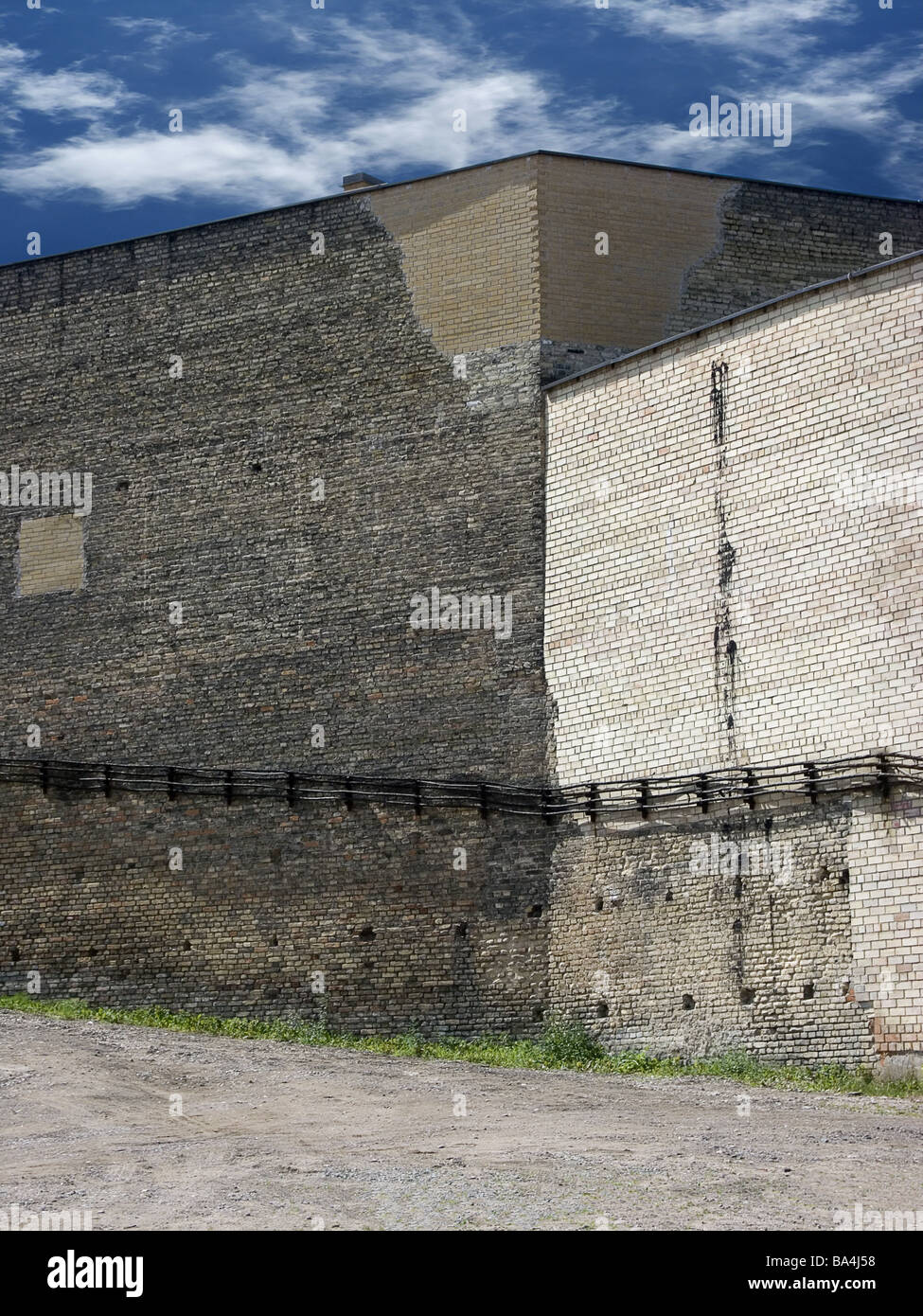 Lithuania Vilnius buildings brick-walls power lines part-renovates ...