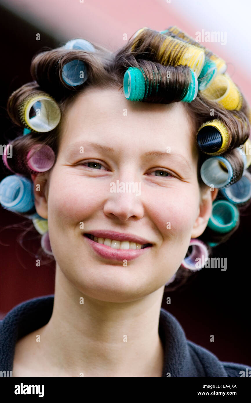 Woman with curlers in the hair Stock Photo - Alamy