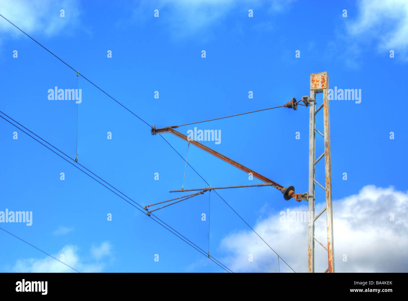 Electrical overhead train wires details closeup on couldy sky Stock ...