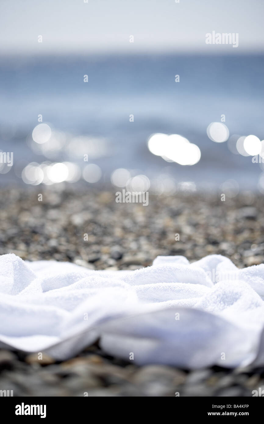 Gravel beach towel detail knows back light shores beach grit shingle ...