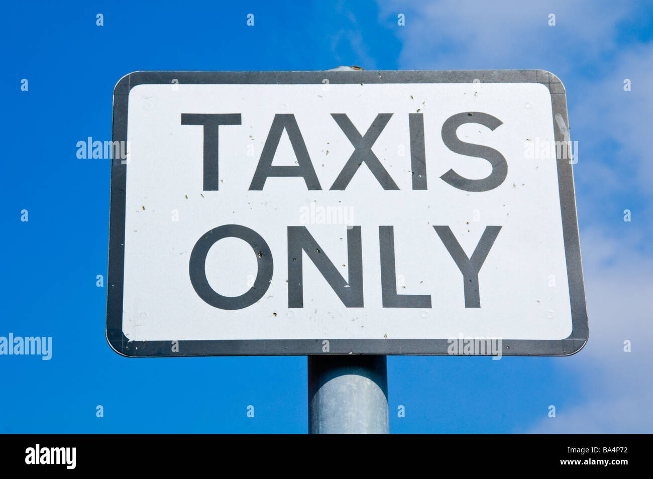 TAXIS ONLY sign in town centre car park Stock Photo - Alamy