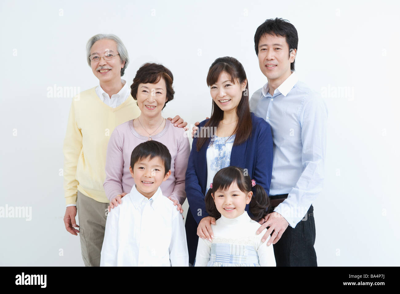Asian family standing together Stock Photo - Alamy