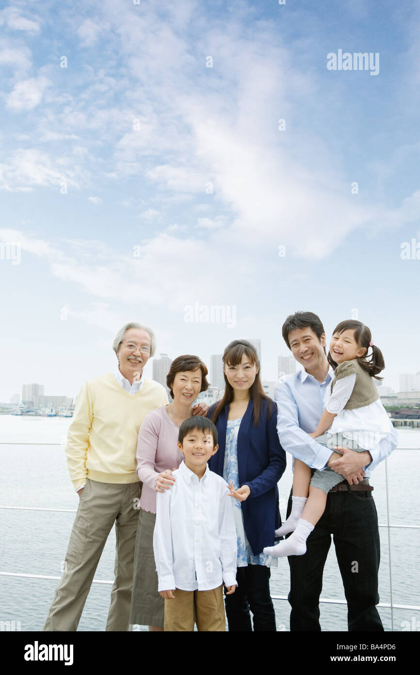 Asian family standing together Stock Photo - Alamy