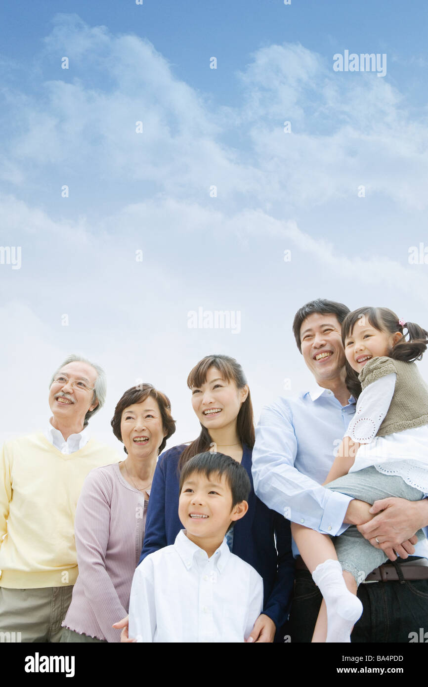 Asian family standing together Stock Photo - Alamy