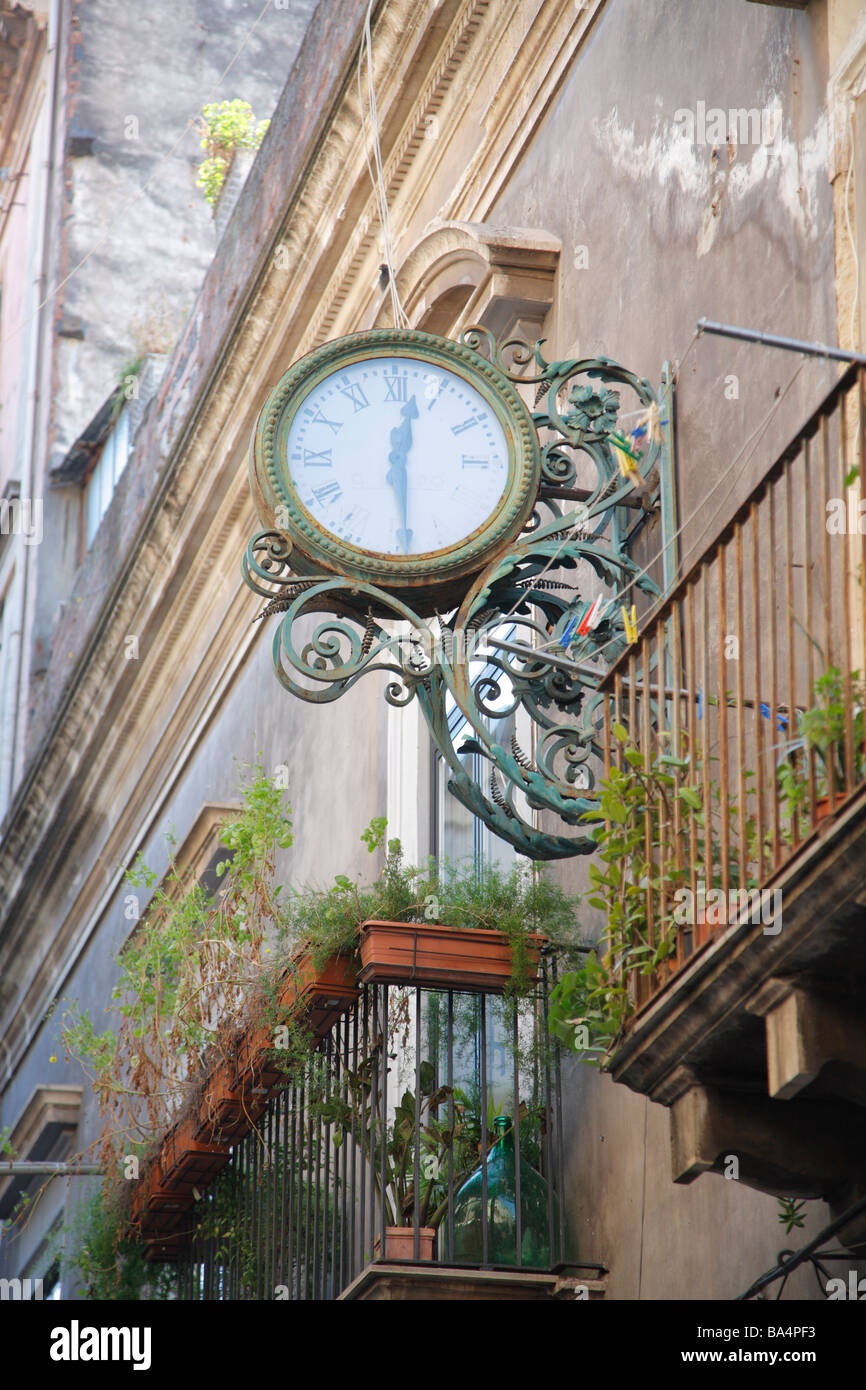 Clock and Balcony, palazzo, Catania, Sicily, Italy Stock Photo - Alamy