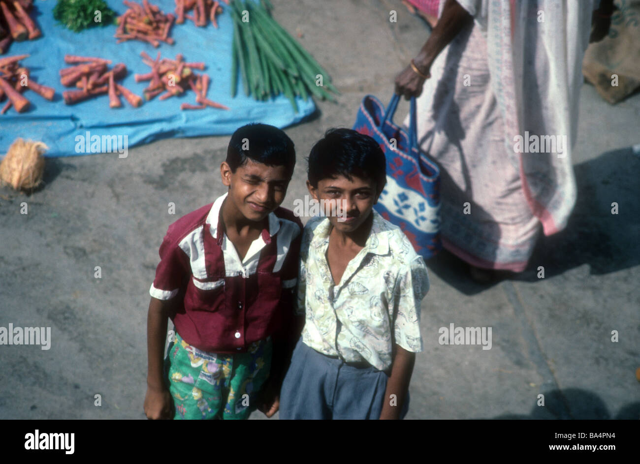 Cheeky Indian boys pose for the camera Diu Gujarat India Stock Photo ...