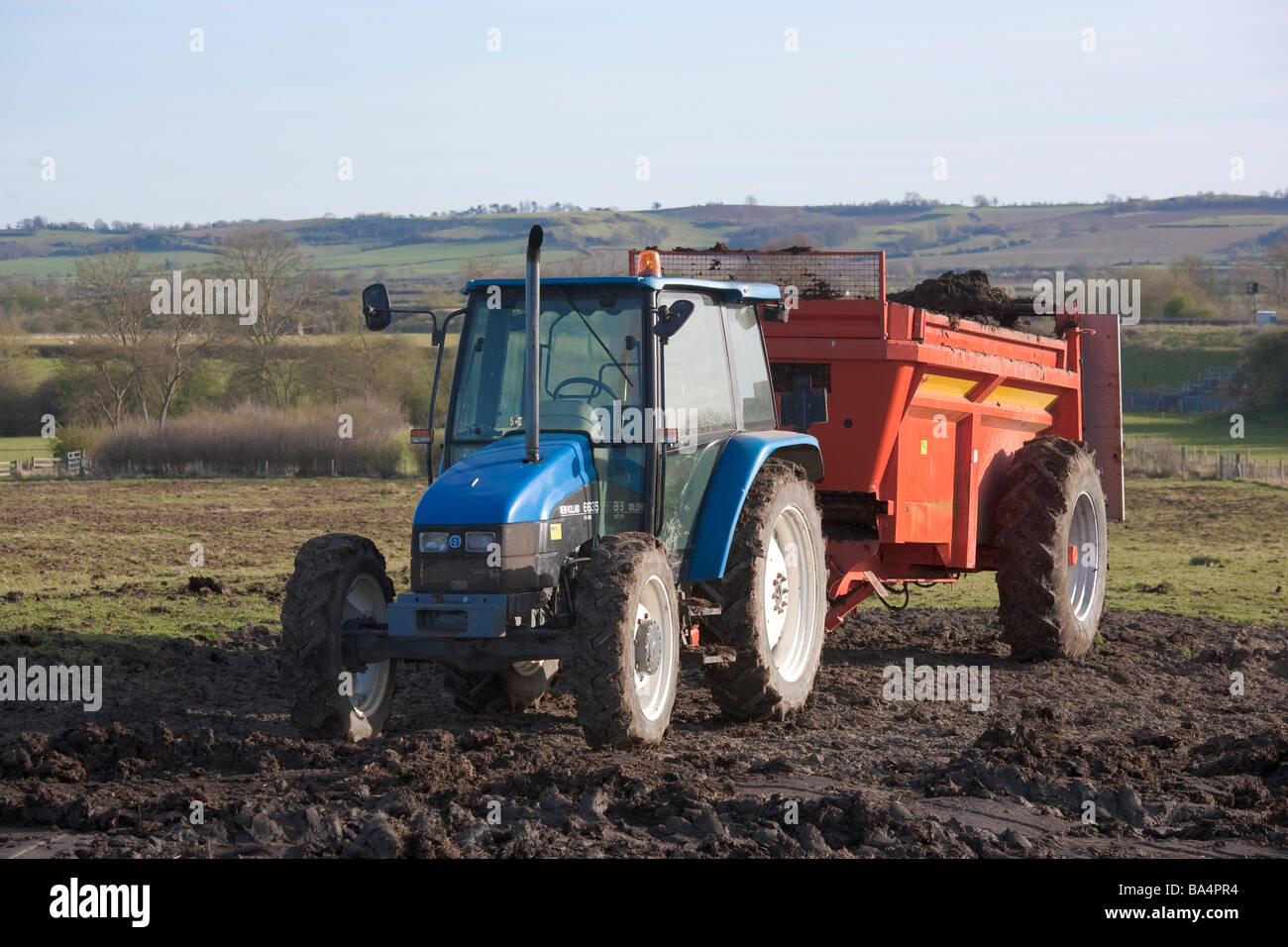 Ford New Holland 6635 tractor and Teagle Rear Discharge Muck Spreader ...