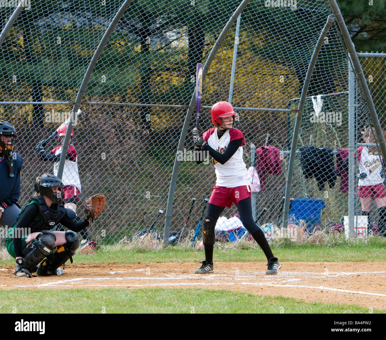 A batter, catcher and umpire at a girls highschool softball game Stock ...