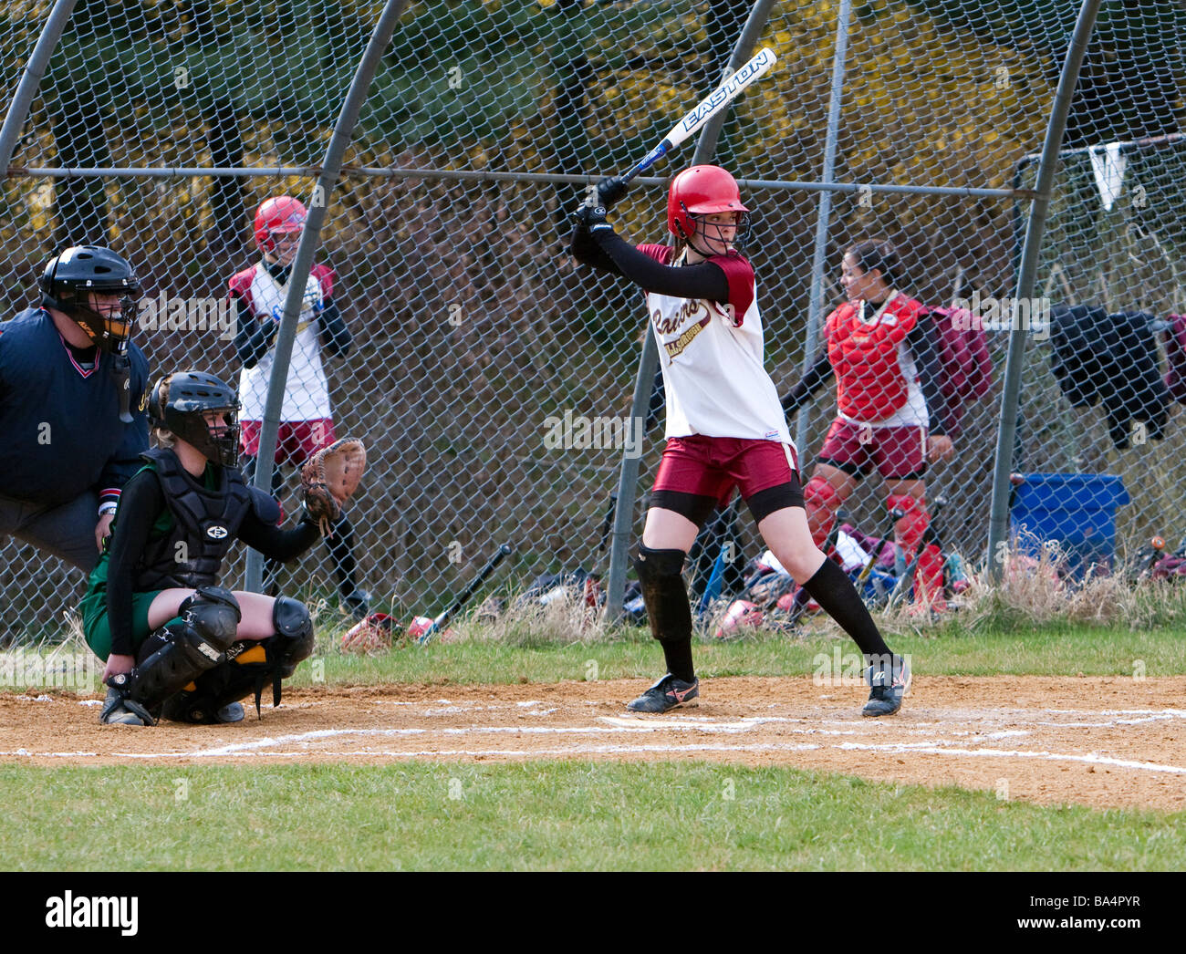 A batter, catcher and umpire at a girls highschool softball game Stock ...