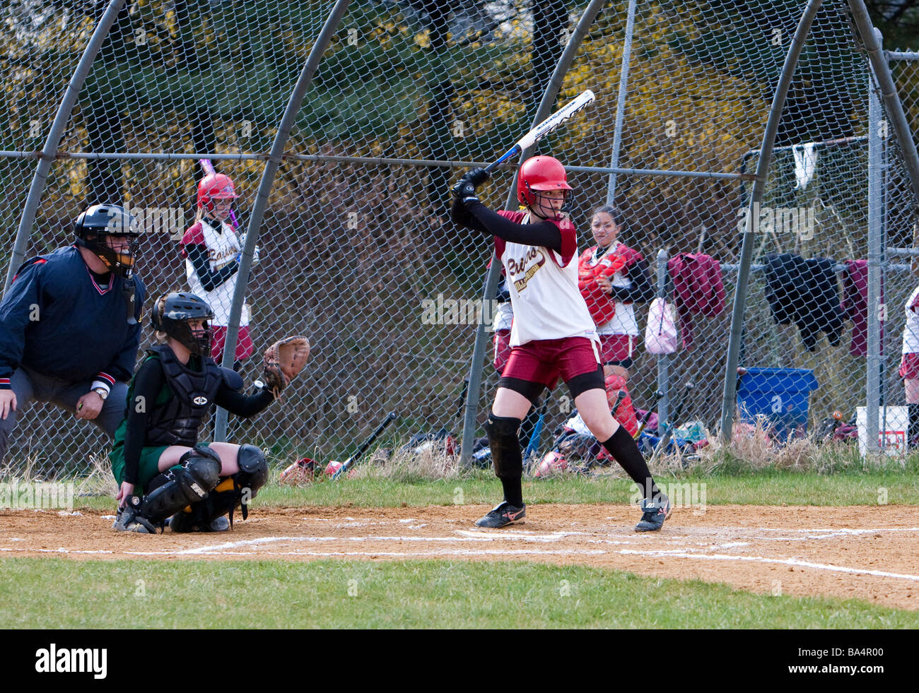 A batter, catcher and umpire at a girls highschool softball game Stock ...