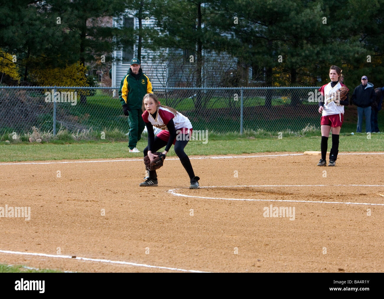 A girls high school softball game Stock Photo - Alamy