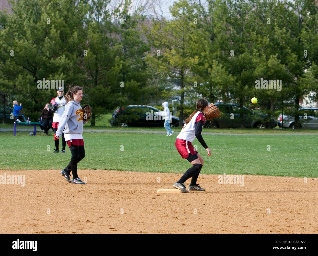 A girls high school softball game Stock Photo - Alamy