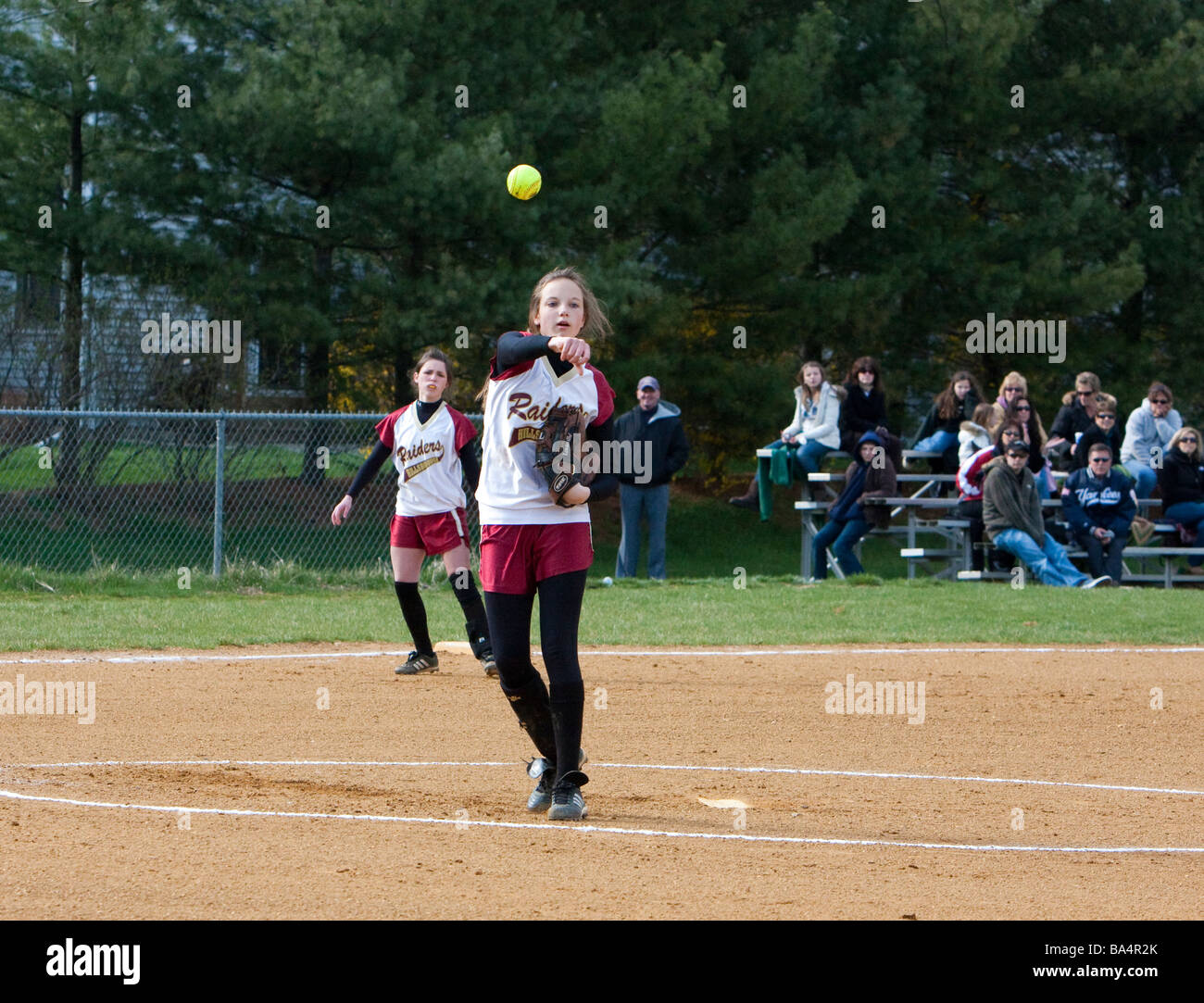 A girls high school softball game Stock Photo - Alamy