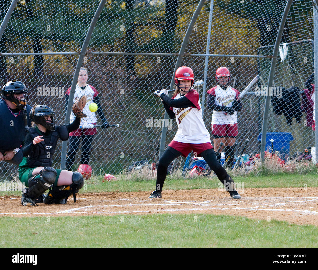 A batter, catcher and umpire at a girls highschool softball game Stock ...