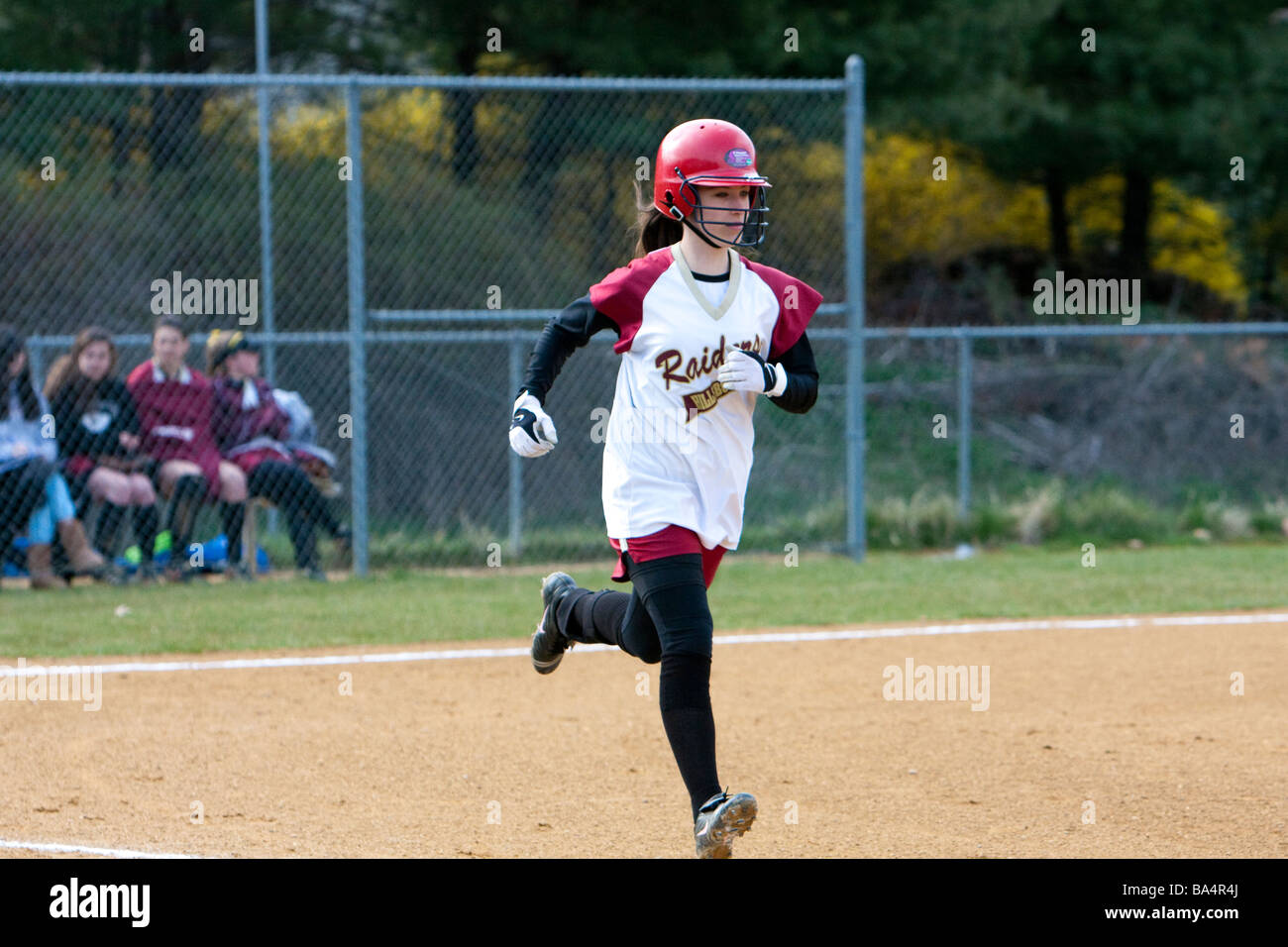 A girls high school softball game Stock Photo - Alamy