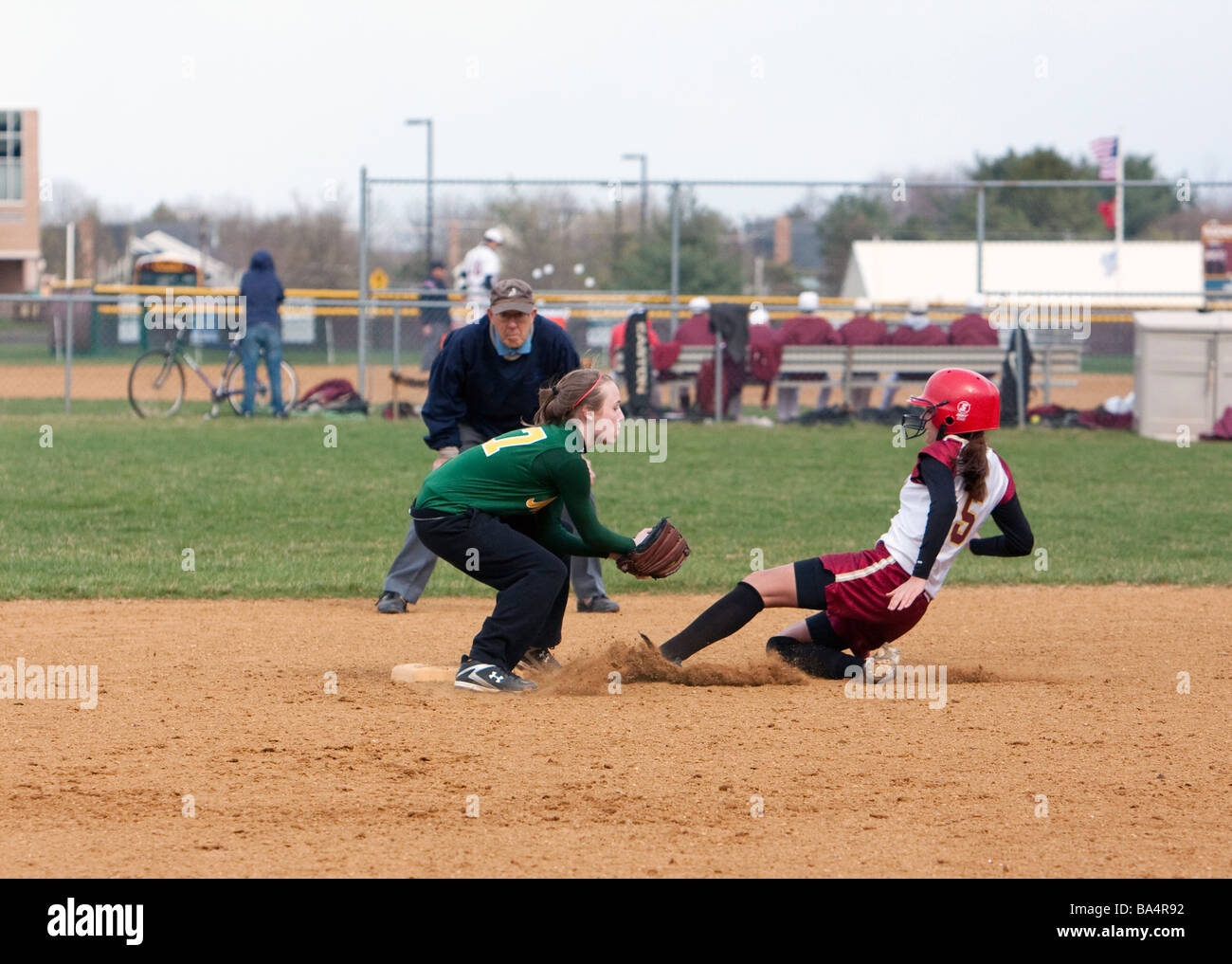 A girls high school softball game Stock Photo - Alamy