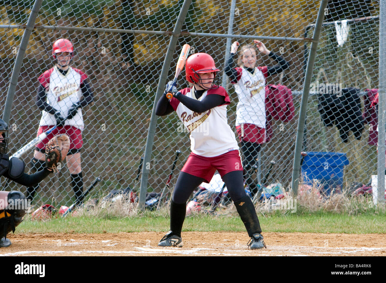 A batter, catcher and umpire at a girls highschool softball game Stock ...