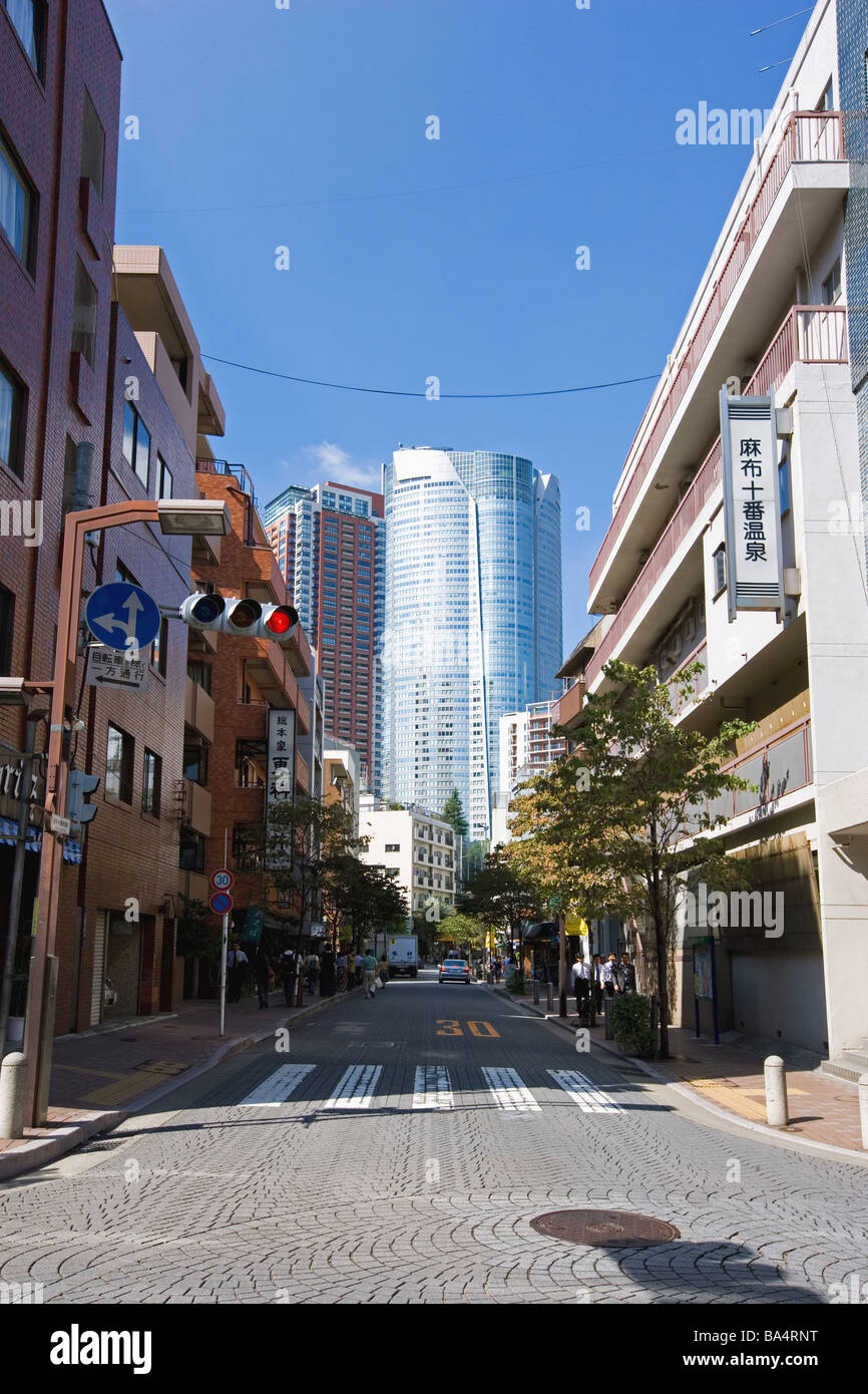Red Light on Road with Mori Tower, Roppongi Hills, Tokyo, Japan Stock ...