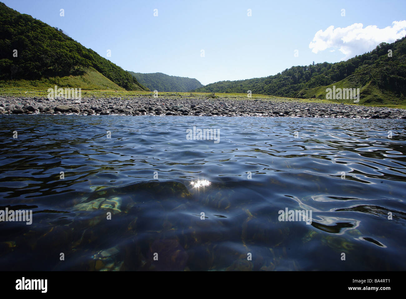 View of Ripples with Pebbles Stock Photo - Alamy