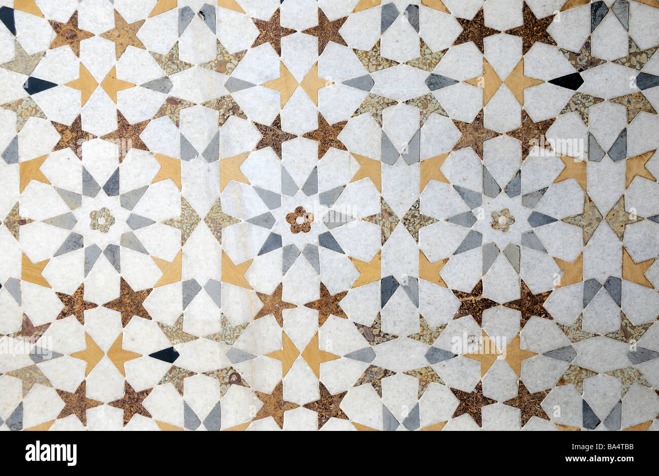 A floor made of a repeating pattern of regular shapes made from semi ...
