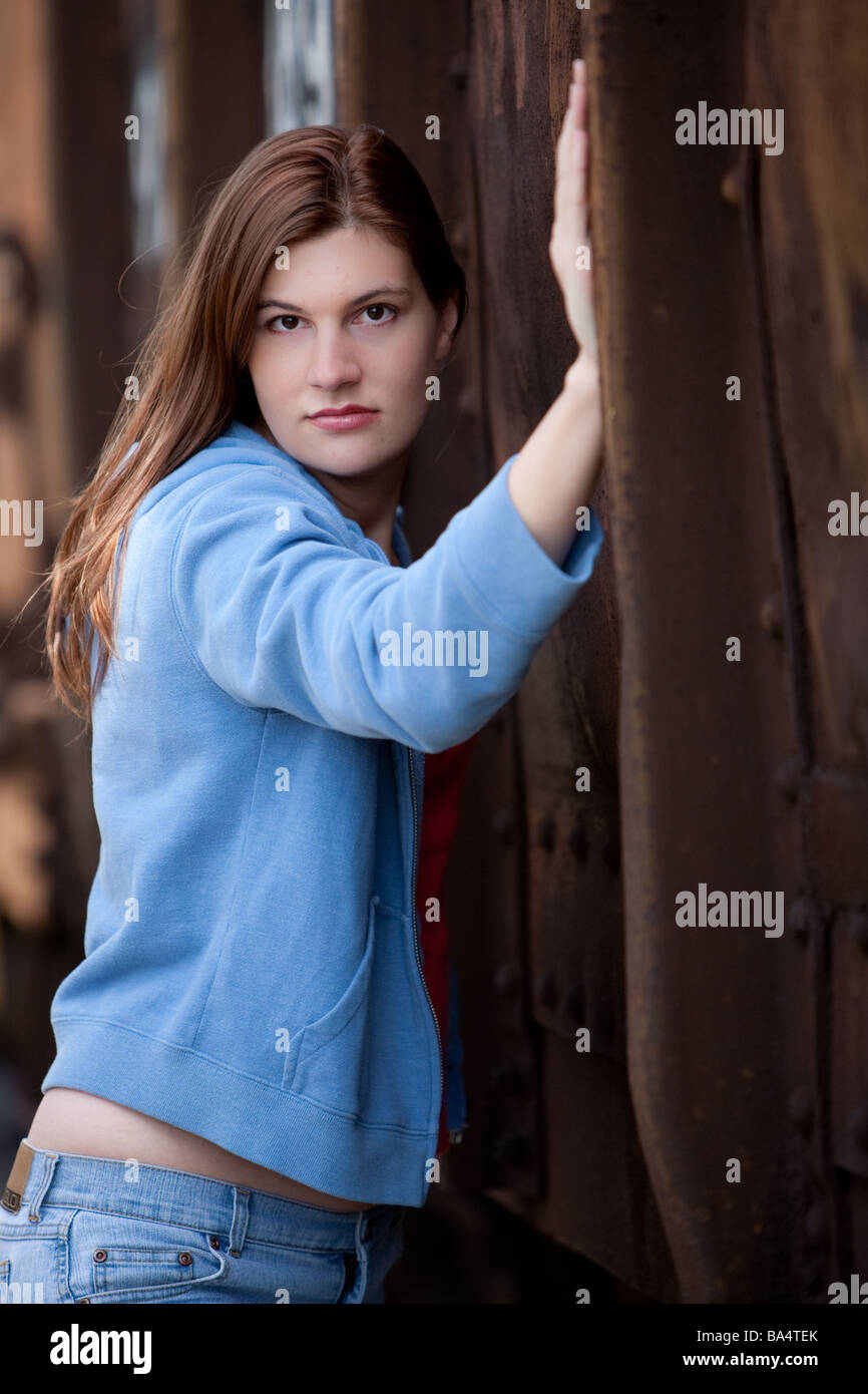 Girl leanin on train car Stock Photo - Alamy